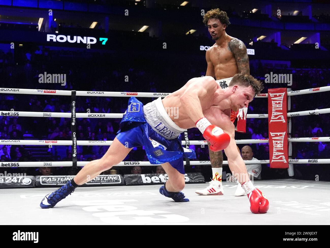 Ben Whittaker knocks down (left) Leon Willings during their light heavy weight bout at The O2 ...