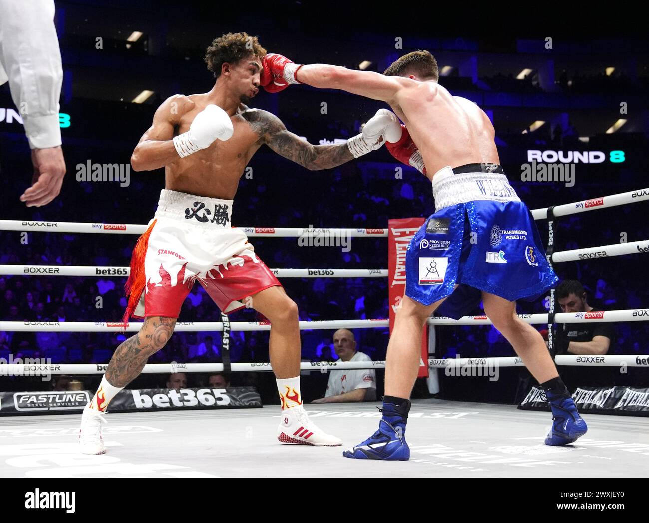 Ben Whittaker (left) and Leon Willings in action during their light ...