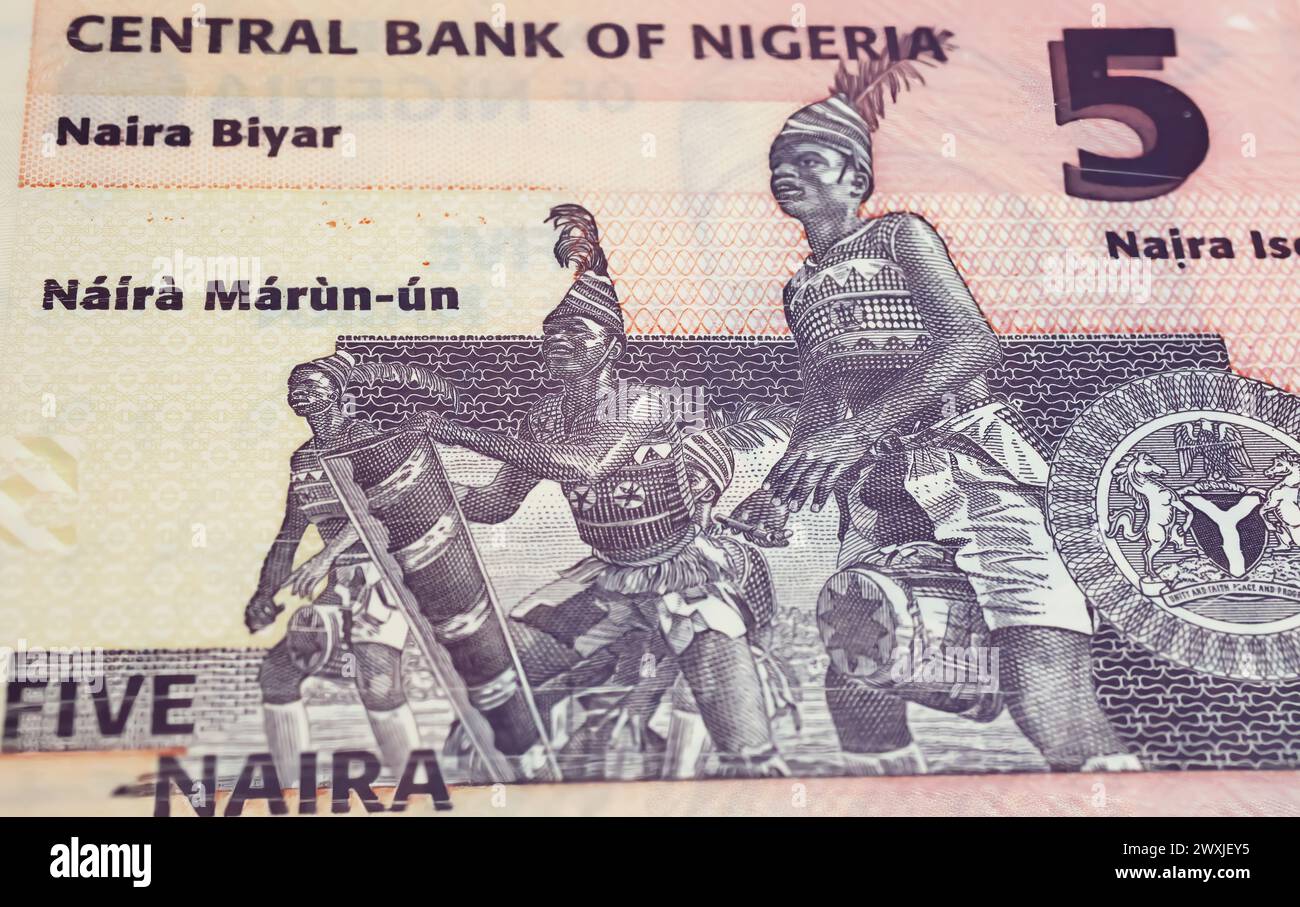 African tribal native motif with drummers on Nigeria 5 Naira currency ...
