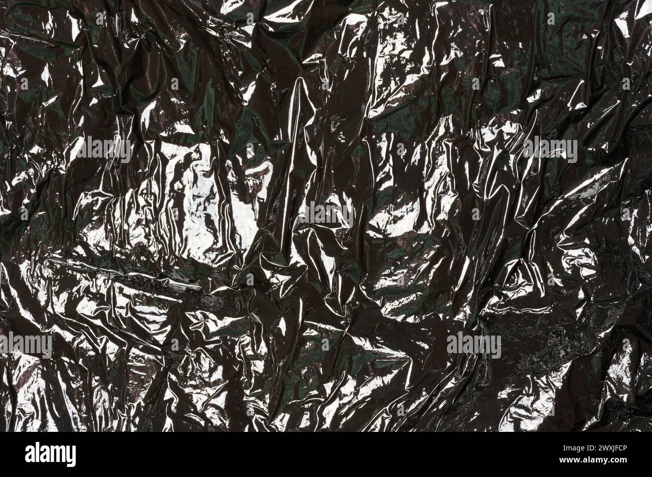 Black crumpled polyethylene film hi-res stock photography and images ...