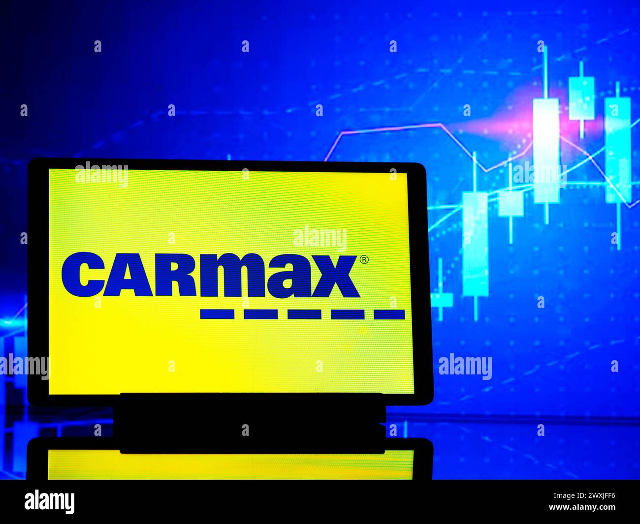 In this photo illustration, CarMax, Inc. logo seen displayed on a ...