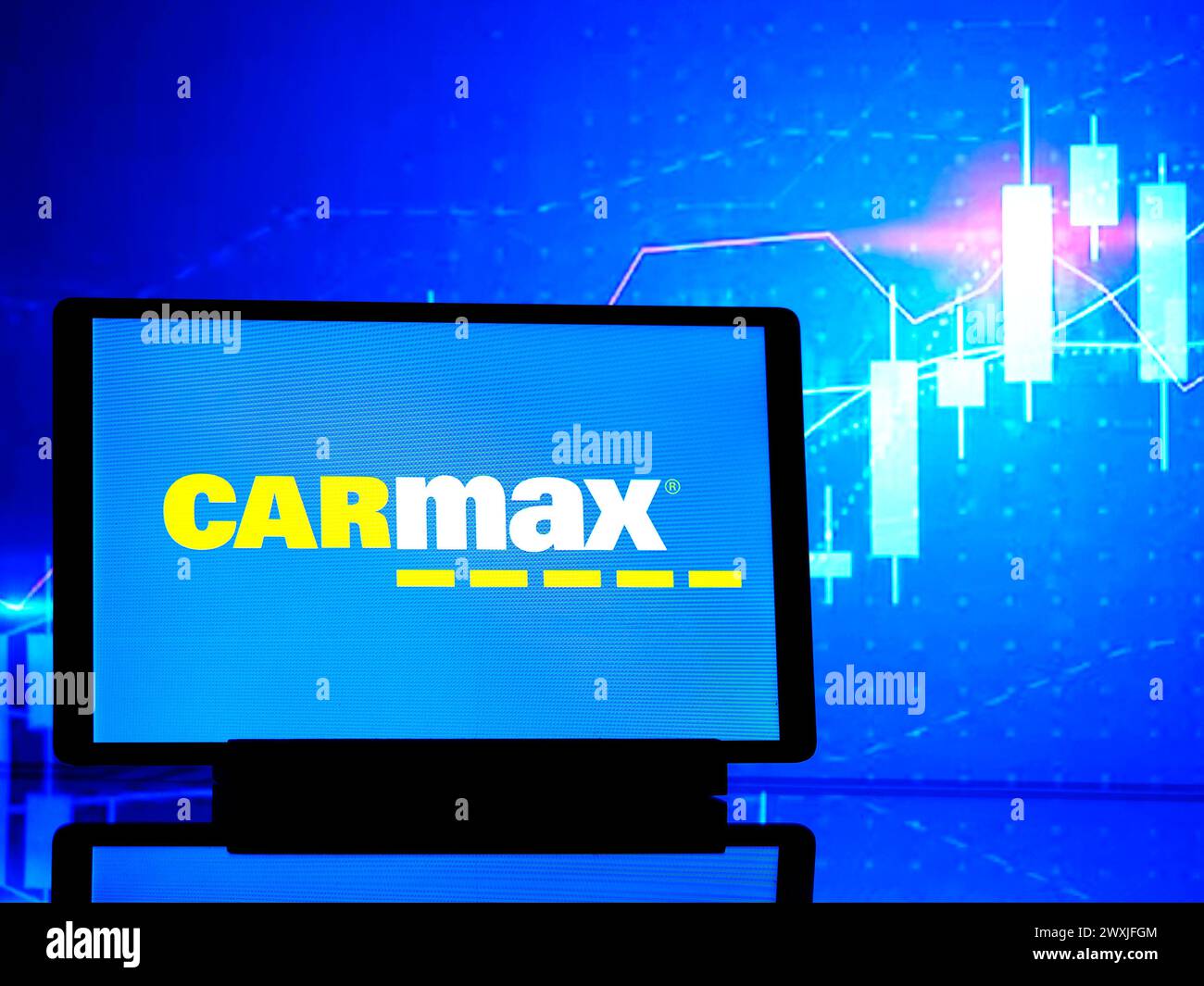 In this photo illustration, CarMax, Inc. logo seen displayed on a ...