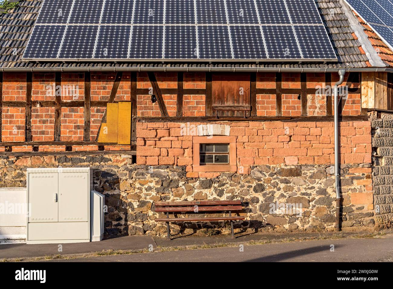 Historic farmhouse with photovoltaic system, solar panels on the roof ...