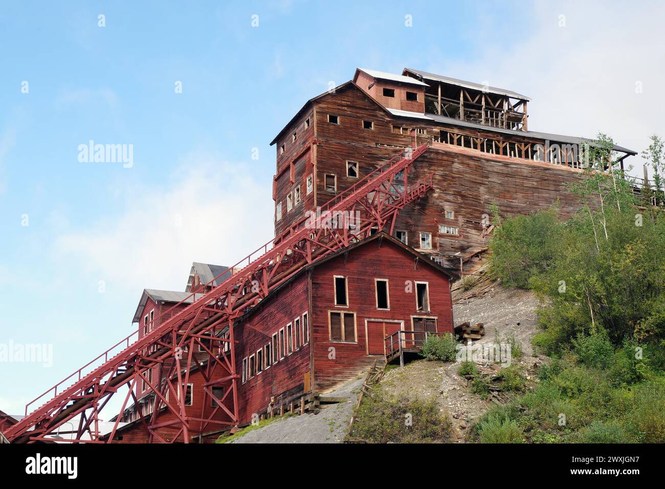 Old industrial ruins on the hillside, copper mining, red wooden ...