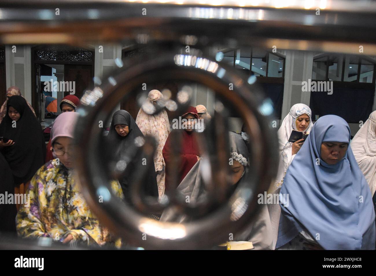 Bandung, West Java, Indonesia. 1st Apr, 2024. Muslim womans read the ...