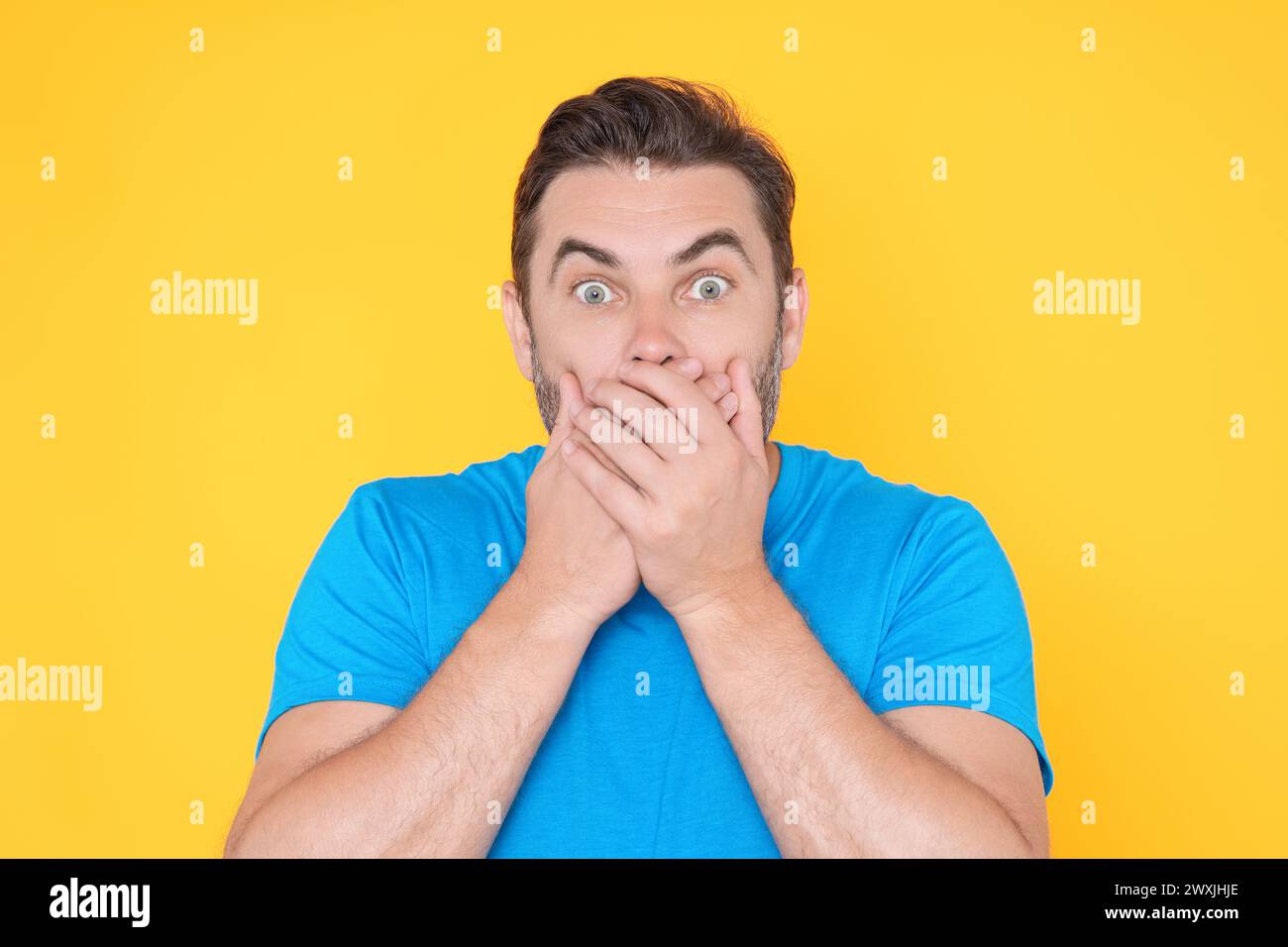 Portrait of shocked unshaven caucasian man afraid and shocked with ...
