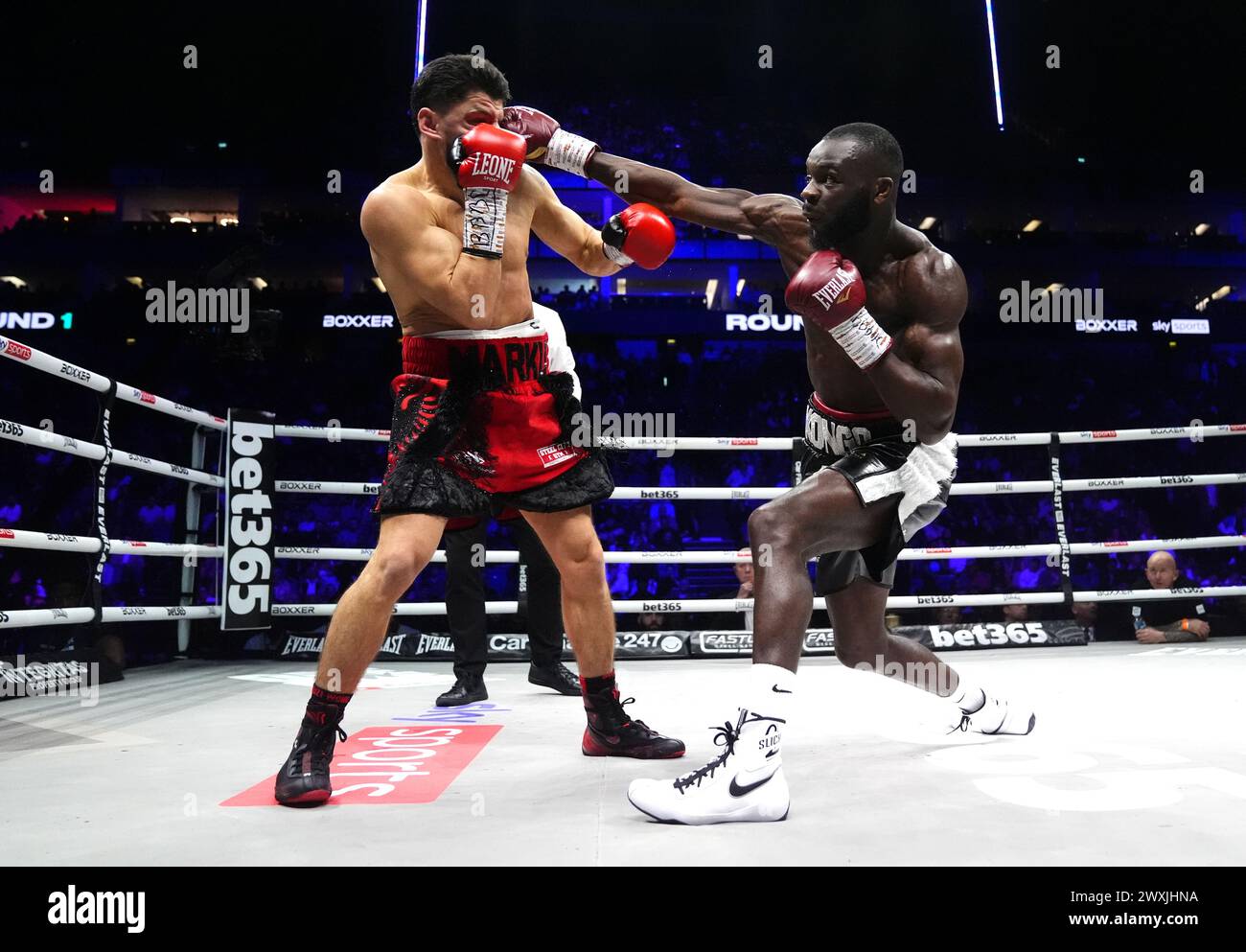 Florian Marku (left) and Chris Kongo in action during their welter ...