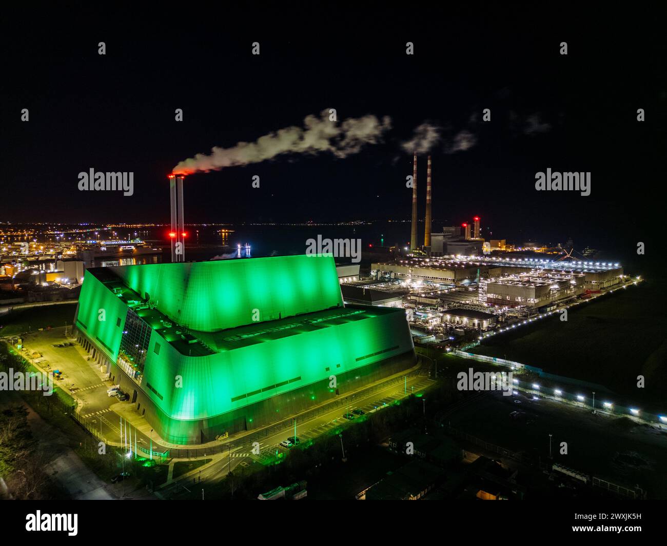 The Poolbeg incinerator lit up in green for St. Patrick's Day Stock ...