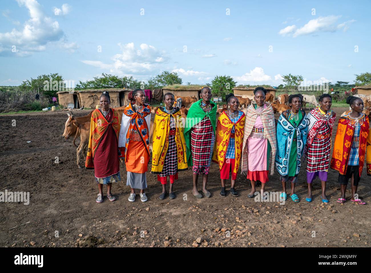 Masai tribe members with colorful dresses Stock Photo - Alamy