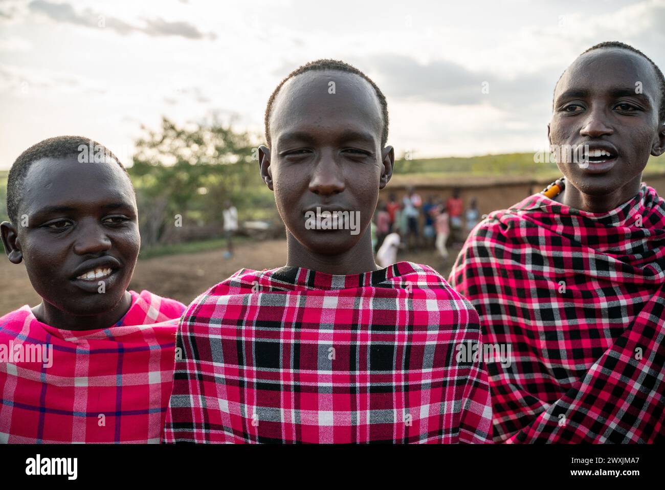 Masai tribe members with colorful dresses Stock Photo - Alamy