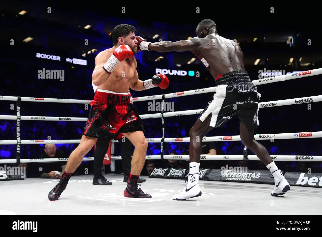 Florian Marku (left) and Chris Kongo in action during their welter ...