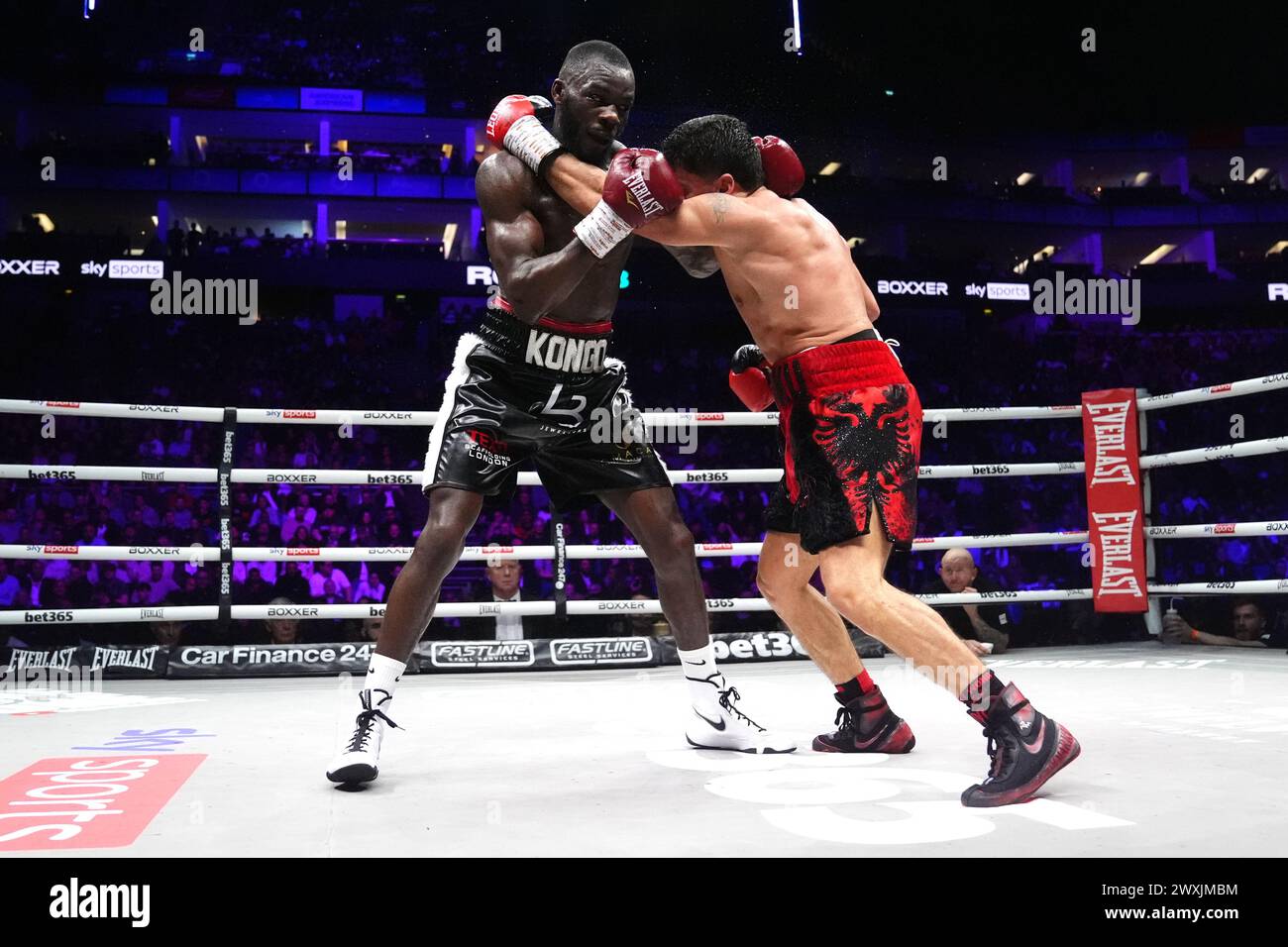 Florian Marku (right) and Chris Kongo in action during their welter ...