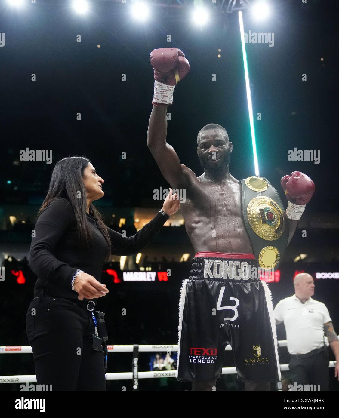 Chris Kongo celebrates after beating Florian Marku (not pictured) at ...