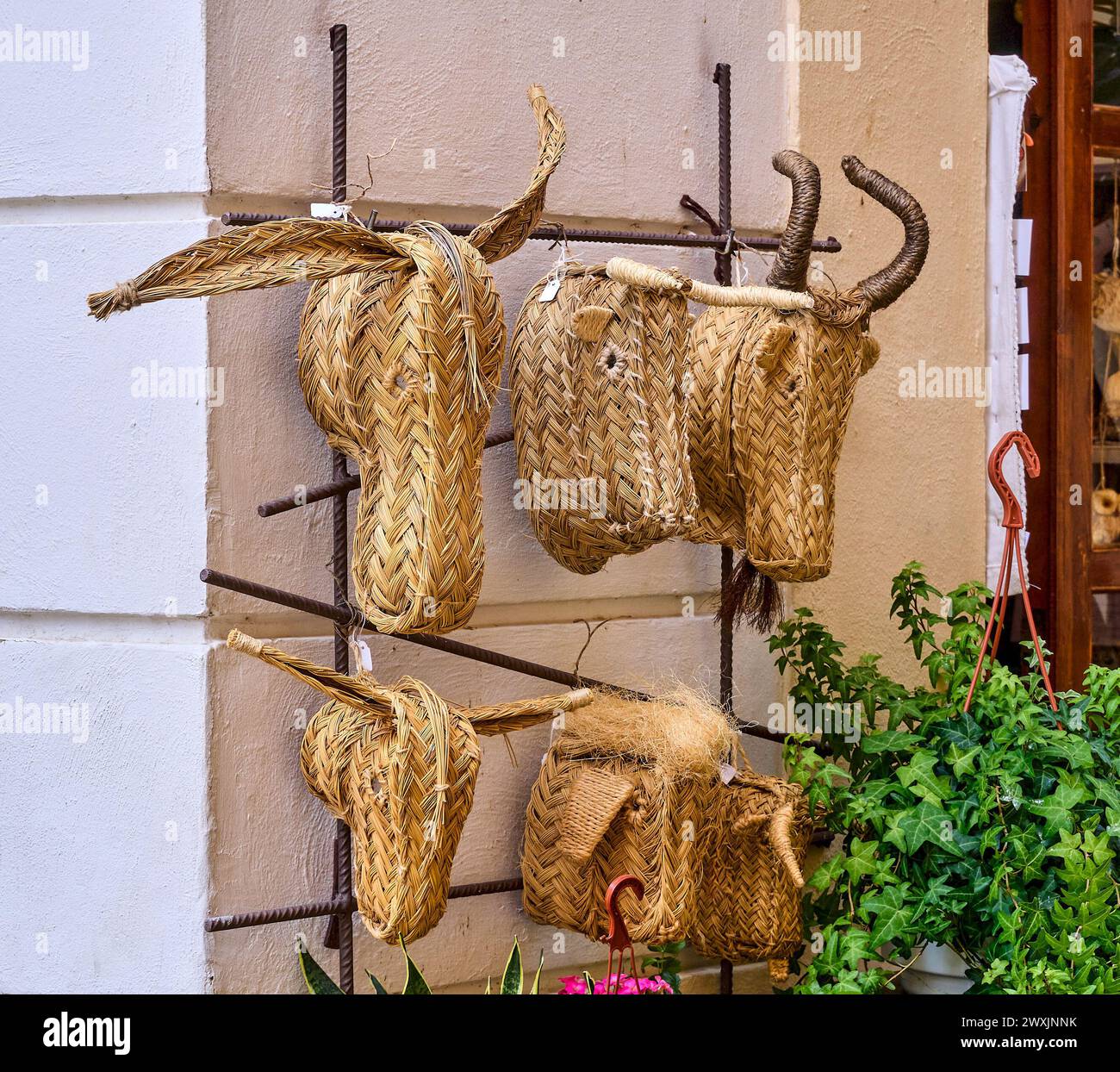 Esparto woven animal head sculptures as wall art Stock Photo - Alamy