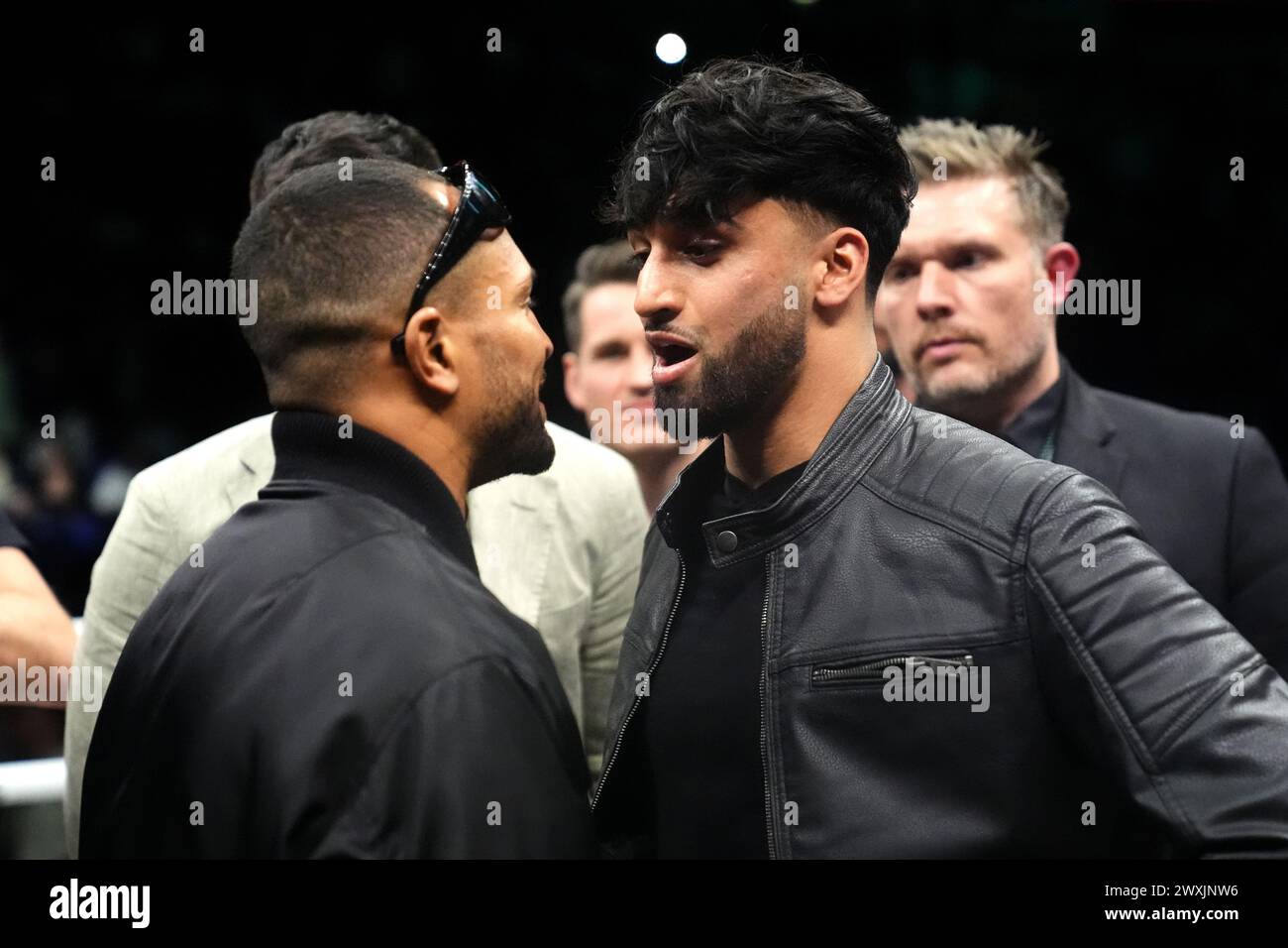Adam Azim (right) faces off against Harlem Eubank at The O2, London ...