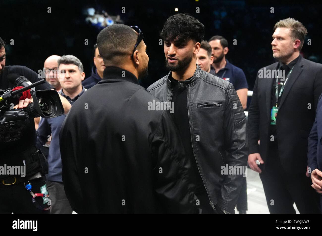 Adam Azim (right) faces off against Harlem Eubank at The O2, London ...