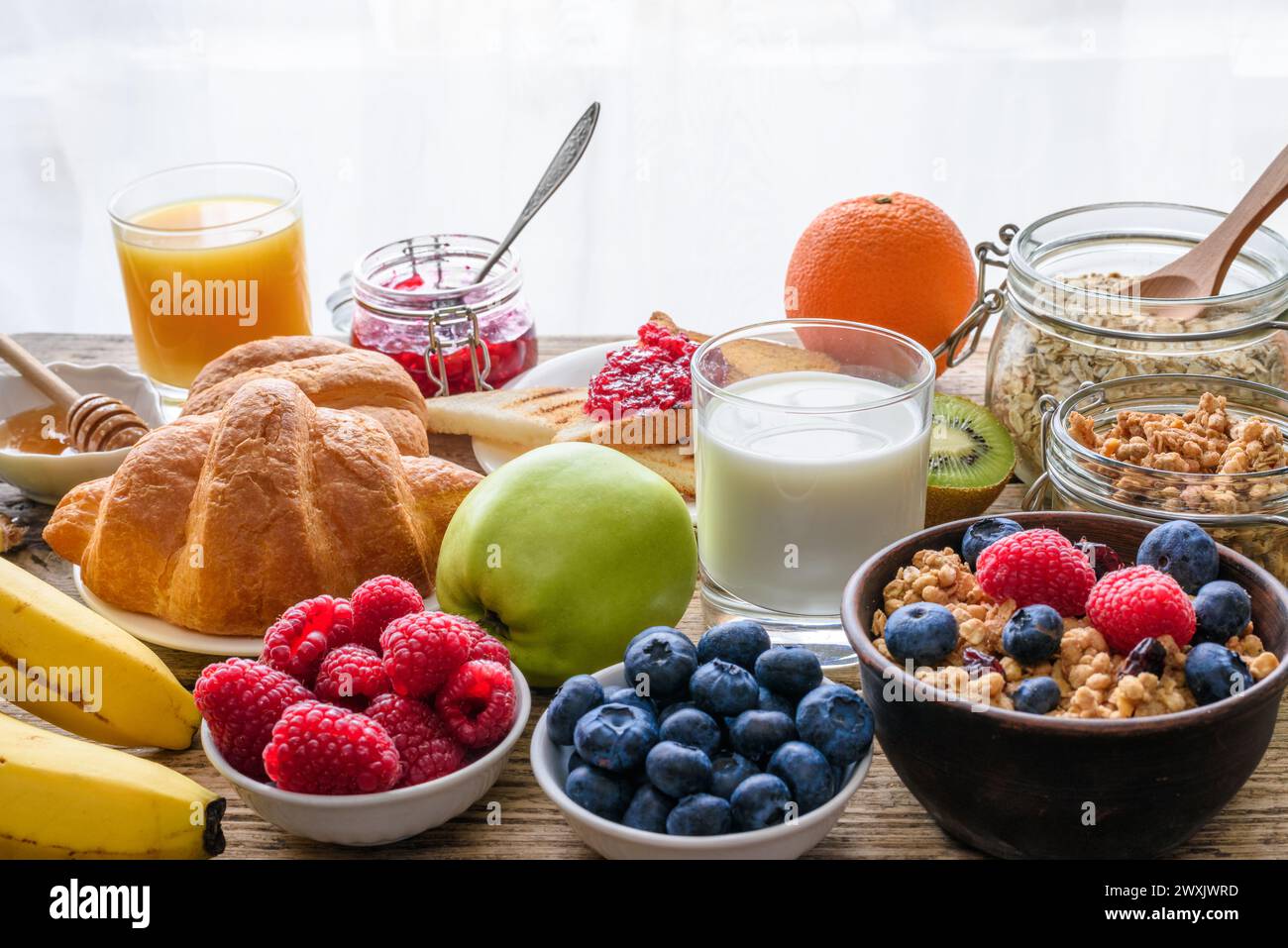 Healthy breakfast buffet with various morning food and drinks. Oats ...