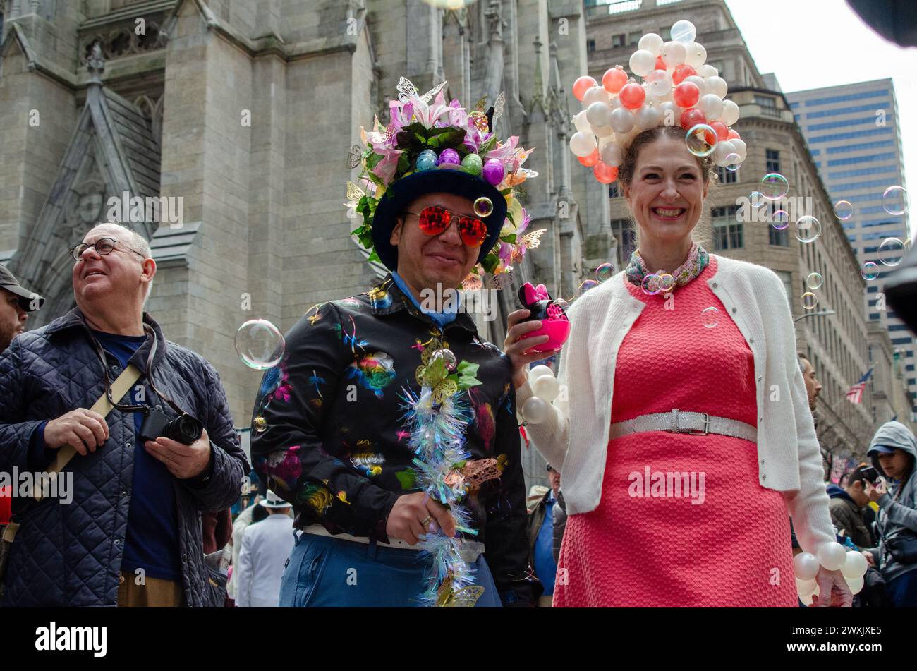 New York, USA. 31st Mar, 2024. People clad in Easter-inspired costumes ...