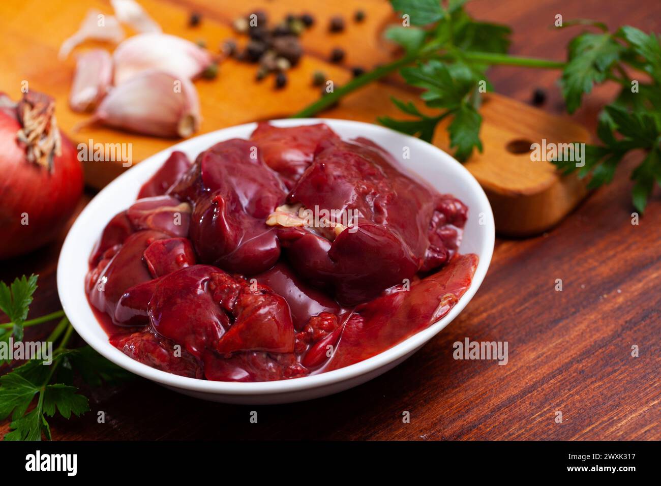 Raw chicken liver Stock Photo - Alamy