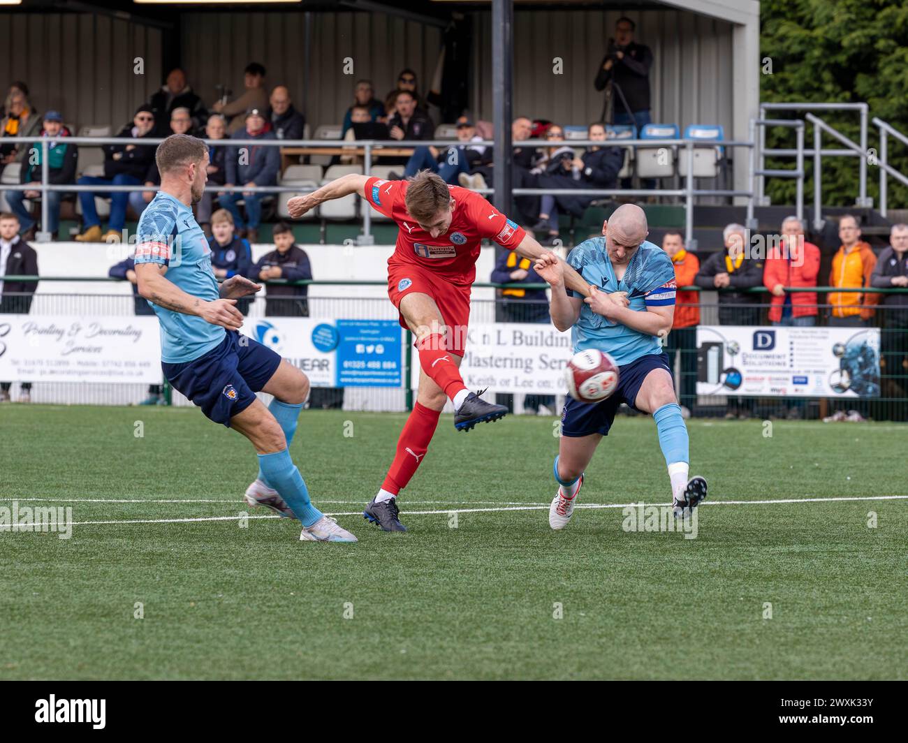 Dan Cockerline shoots at goal despite being challenged when Morpeth ...