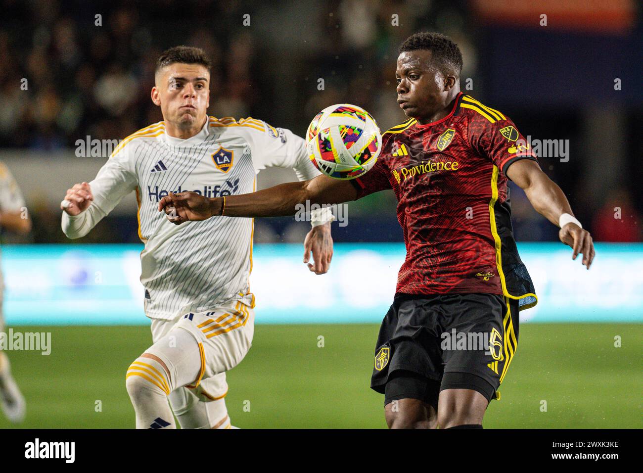 Seattle Sounders defender Nouhou Tolo (5) chests a ball against Los ...