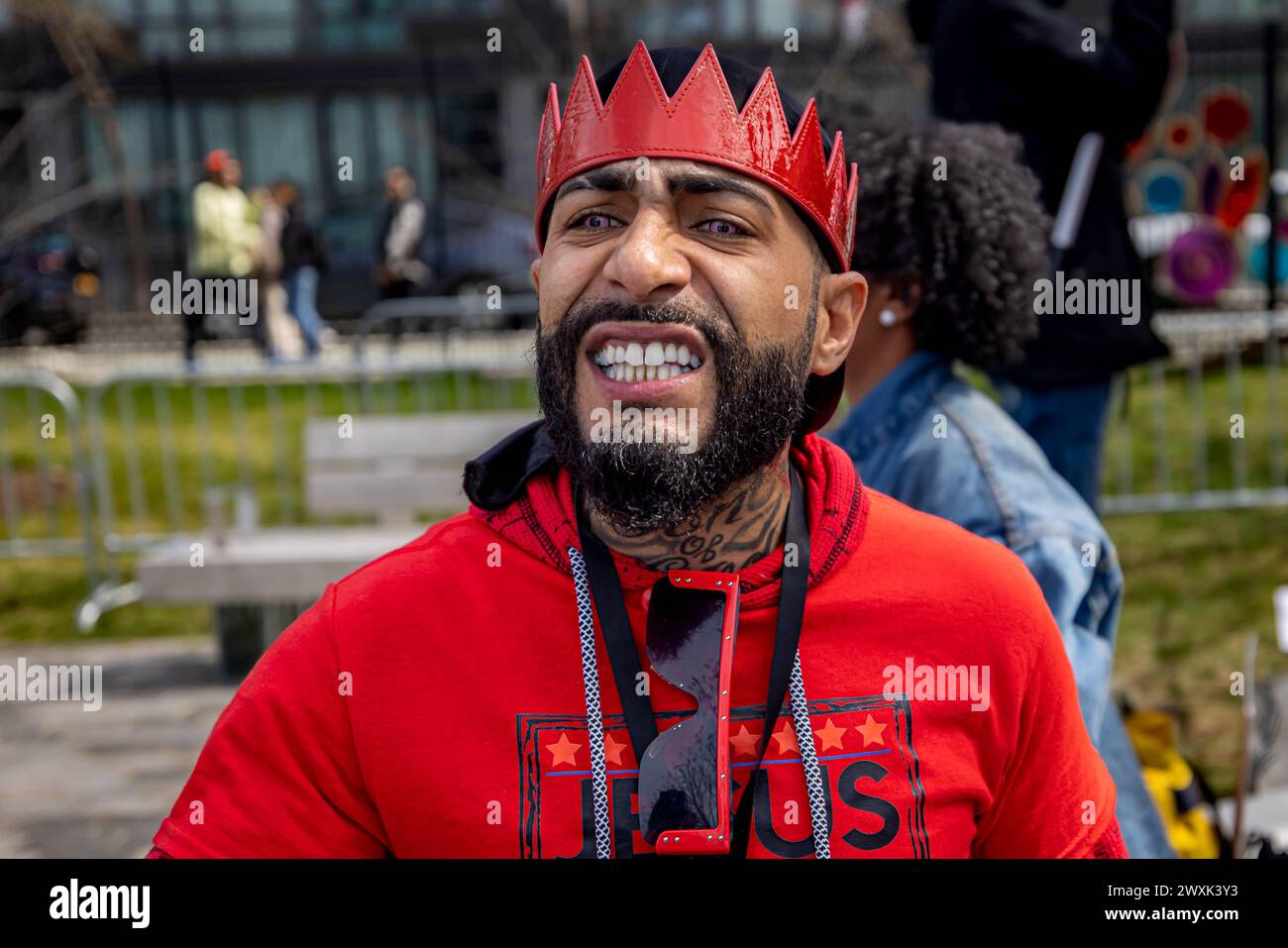 New York, United States. 30th Mar, 2024. A far right activist jeers and ...