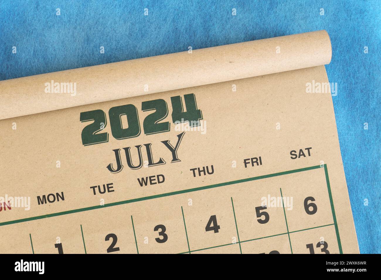 July 2024 calendar flat lay in blue background with copy space Stock ...