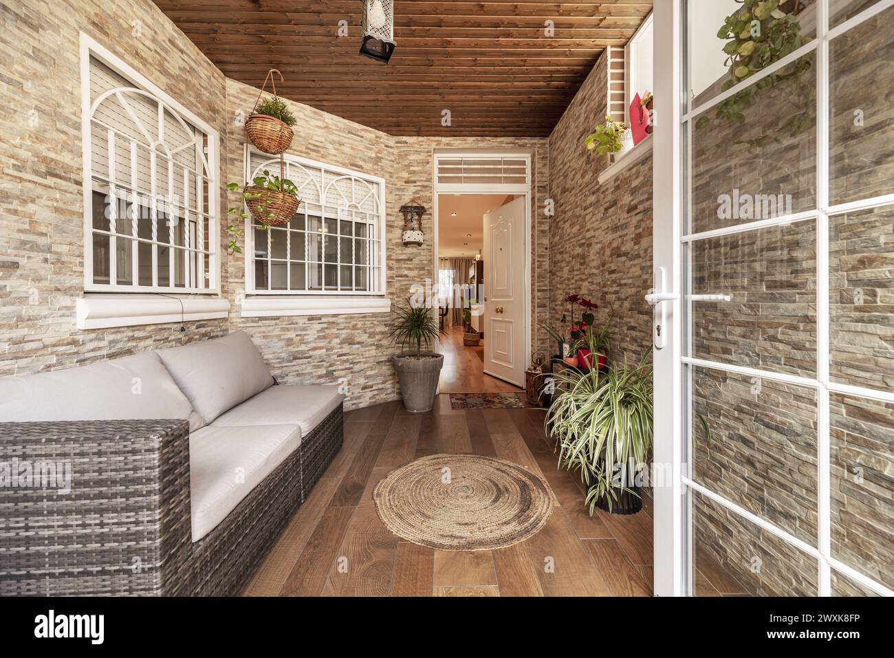 Entrance porch of a multi-story single-family house with brick facades ...