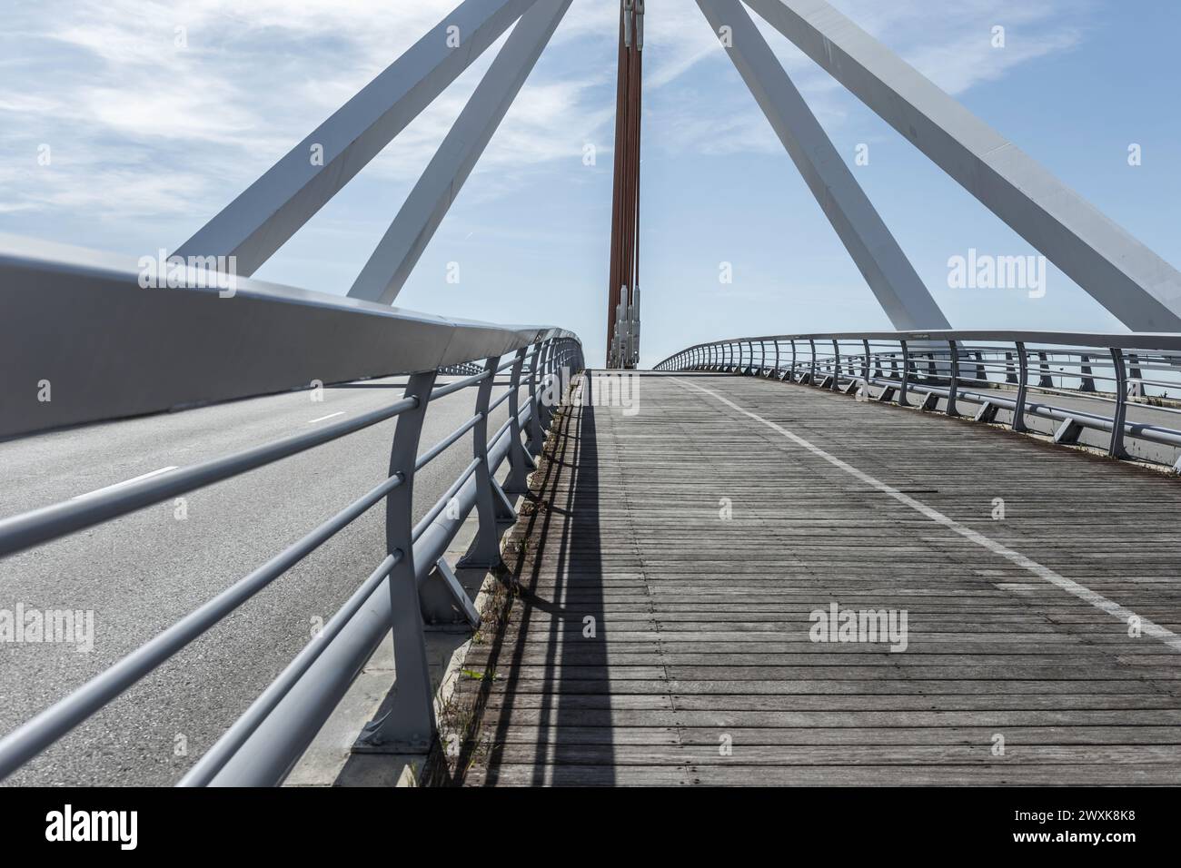Detail of the pedestrian pavement of a small suspension bridge with a ...