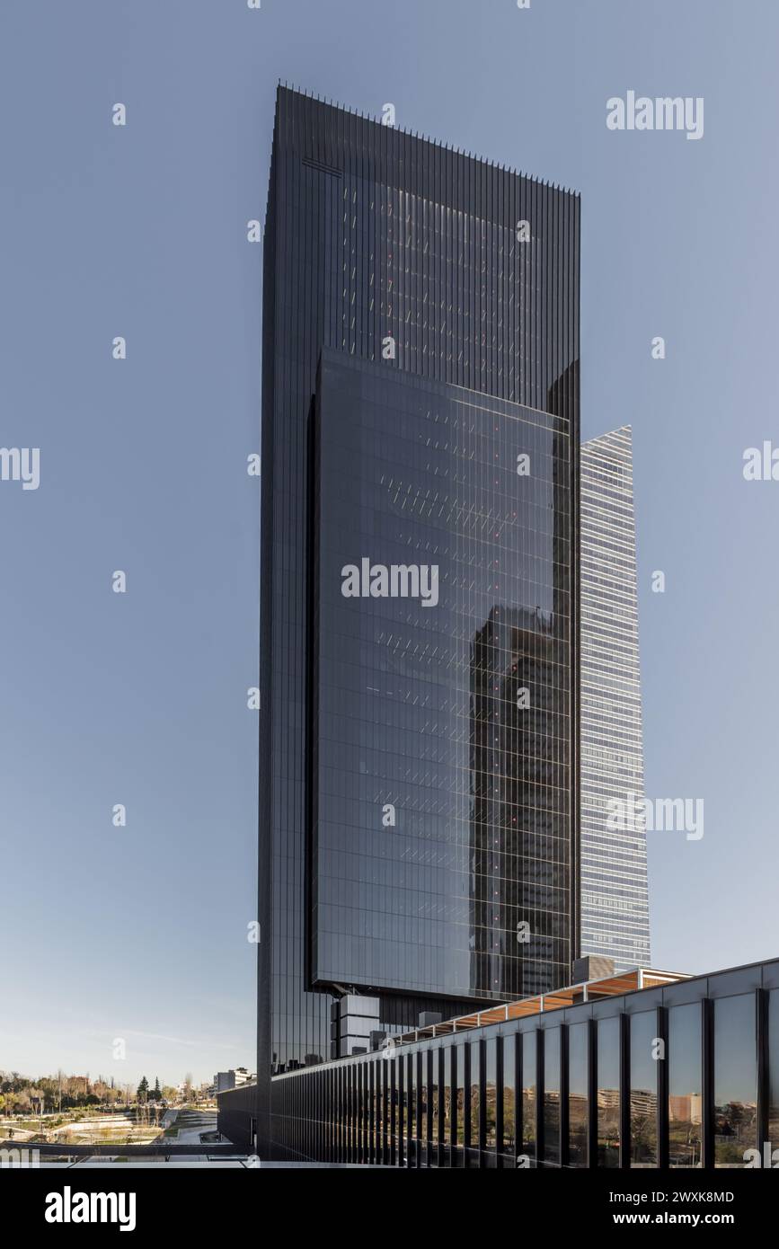A large new black glass office building on the skyline of Madrid, Spain ...