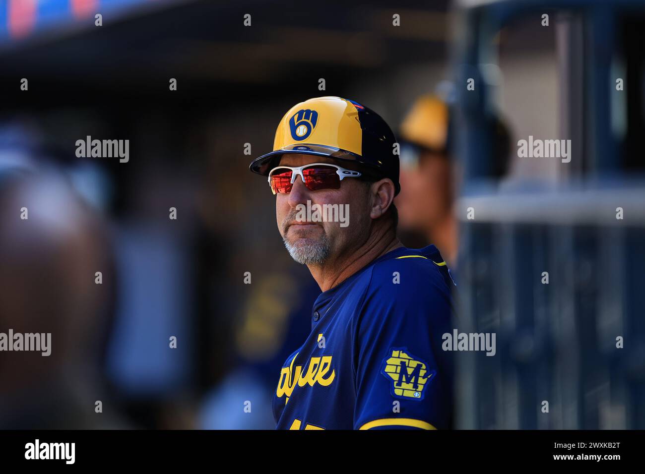 Milwaukee Brewers third base coach Jason Lane #40 watches action during ...