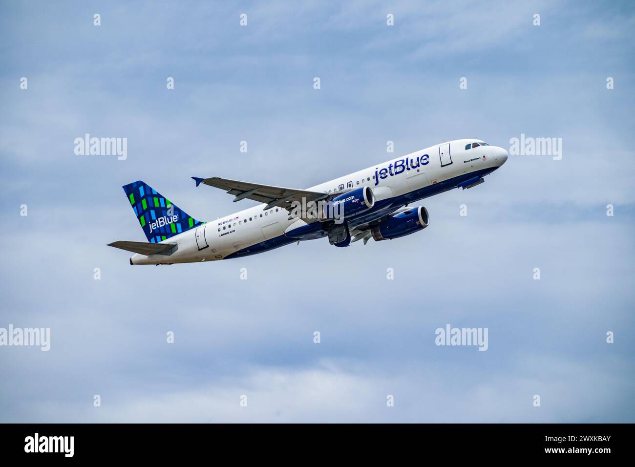Fort Lauderdale, FL, USA - March 22, 2024: Photo of JetBlue in midair ...