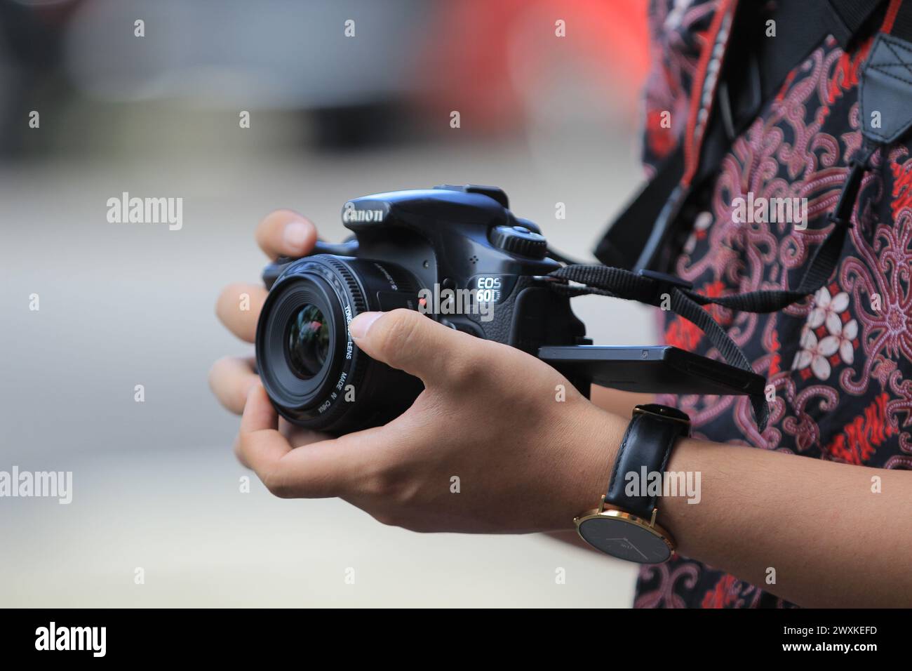 Video camera in hand canon video photo camera hi-res stock photography ...