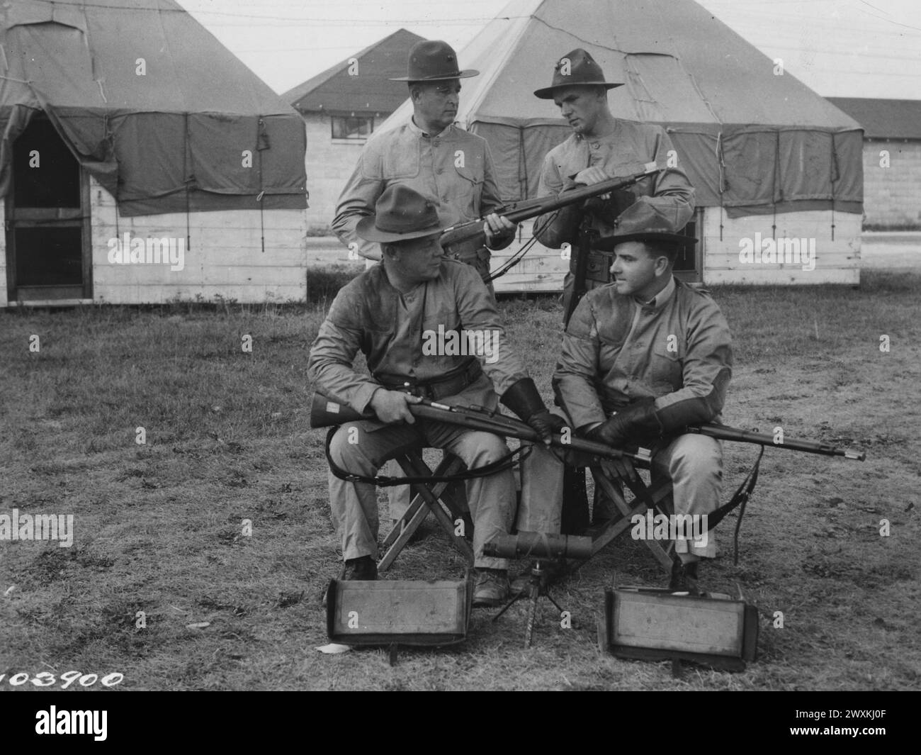 Original caption: Standing: Sgt. John Blakely, 1935 winner of the ...