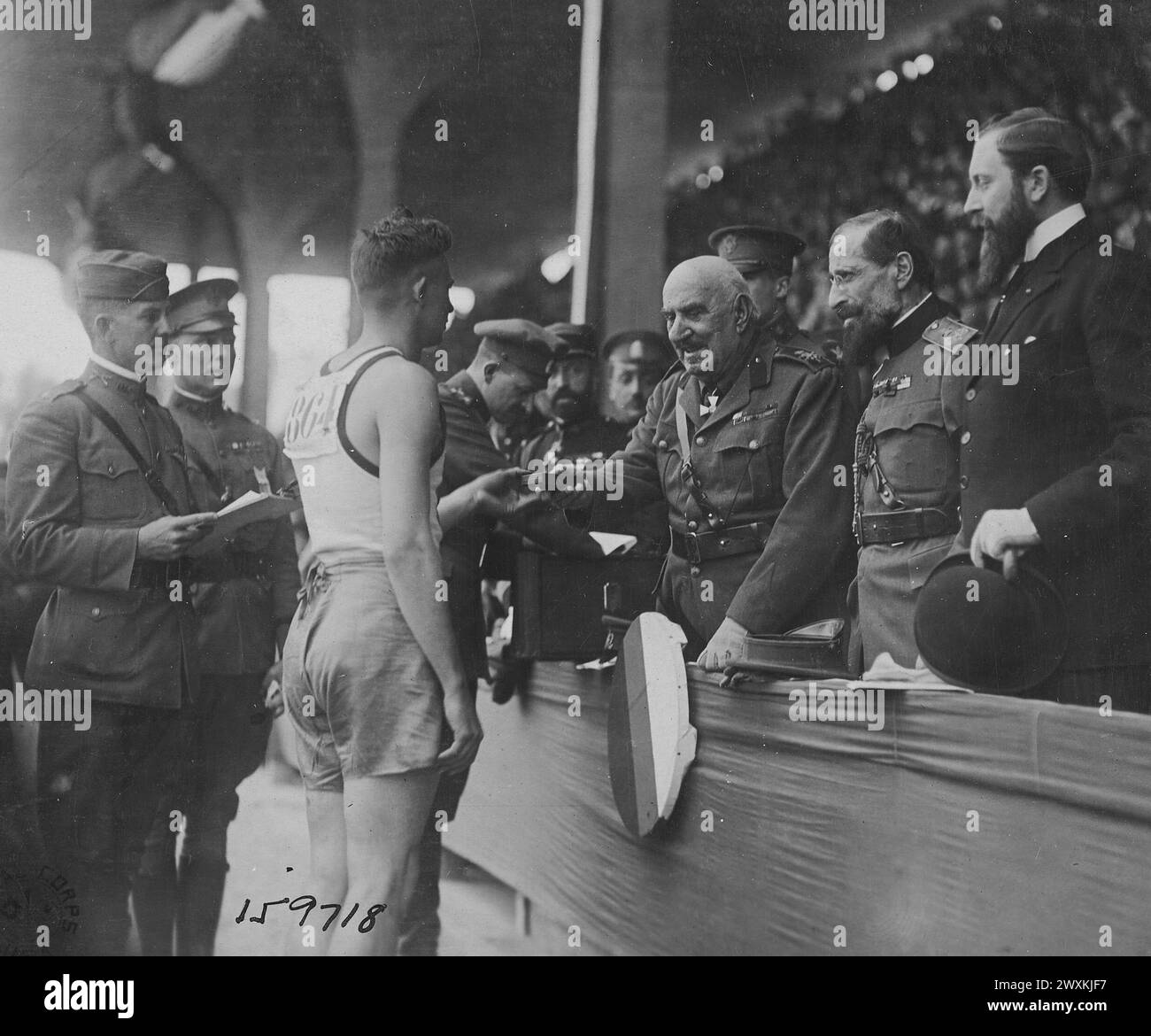 King Nicholas of Montenegro presenting athlete with medal. Stadium ...