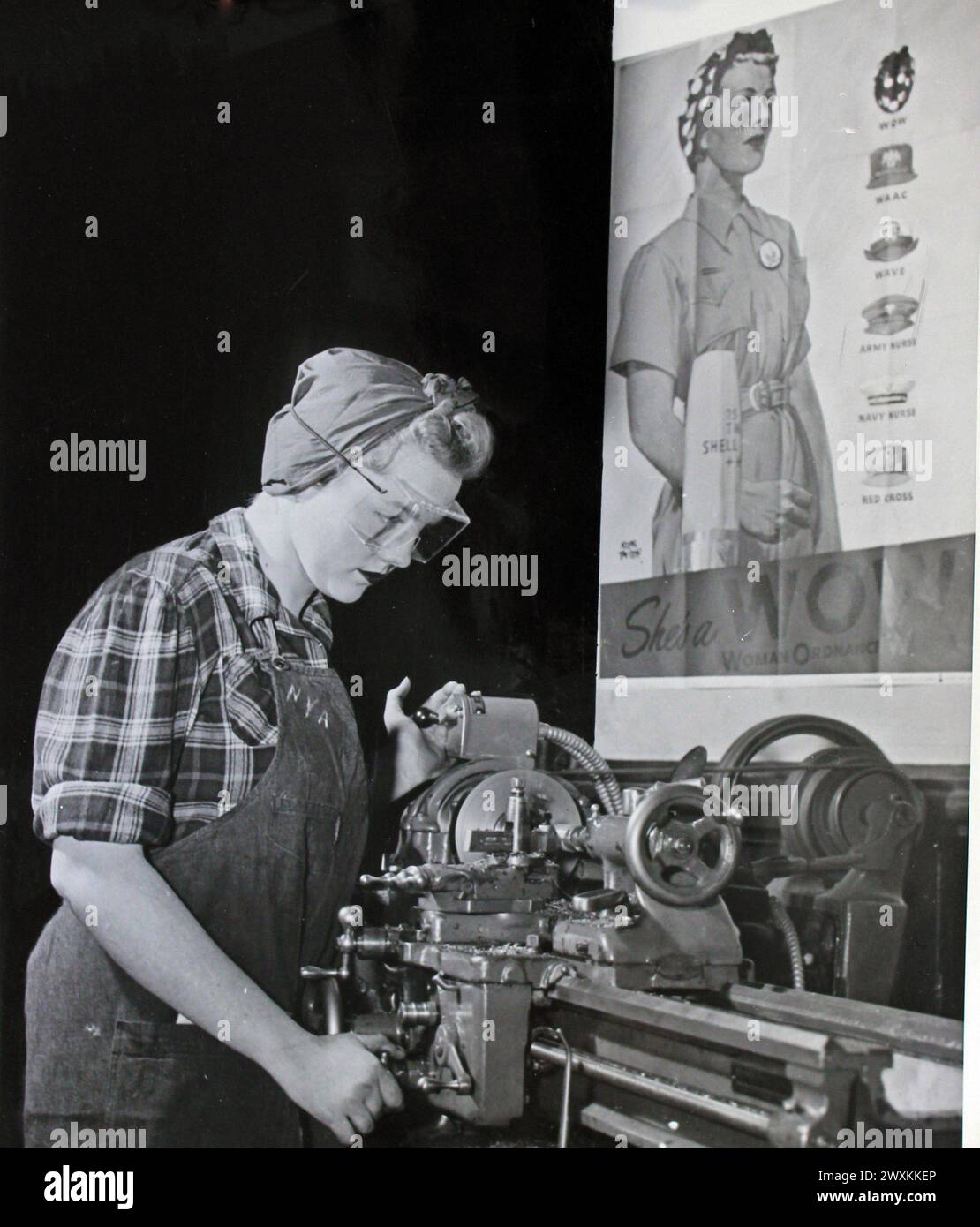 This photograph depicts a young Woman Ordnance Worker who received ...