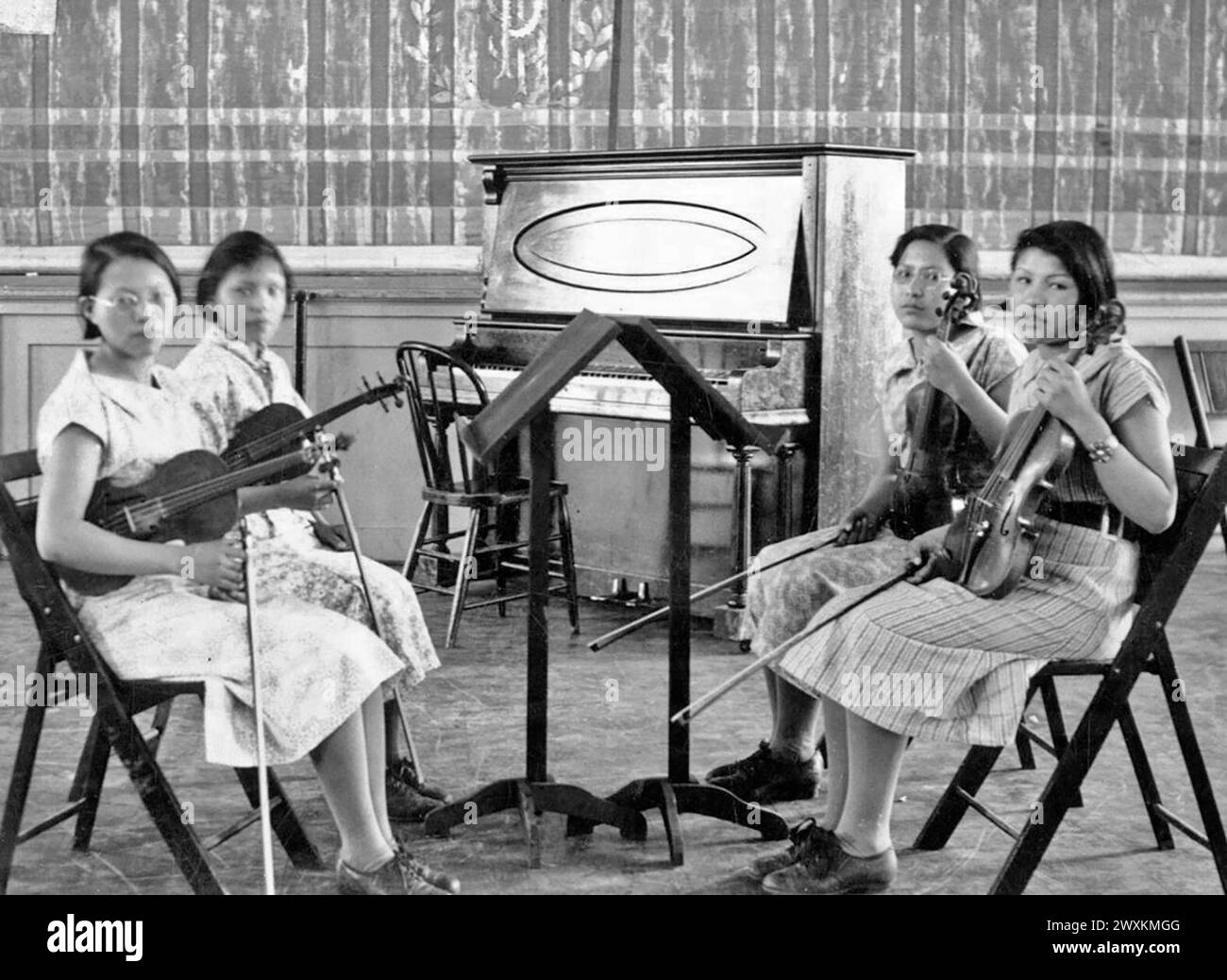 Four female students in a music class at an Indian school in South ...