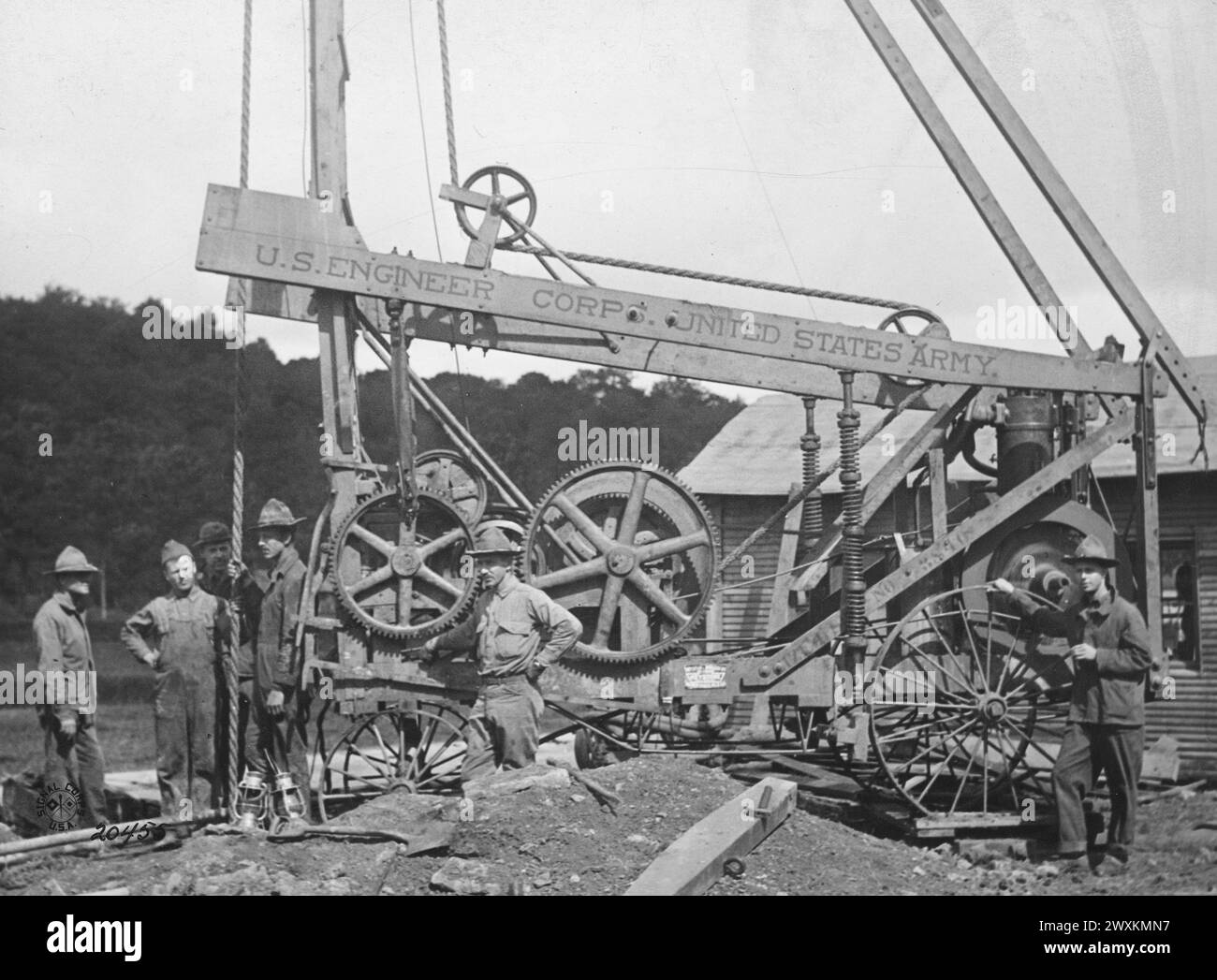Men of the U.S. Engineers Corps digging a well in France to supply ...