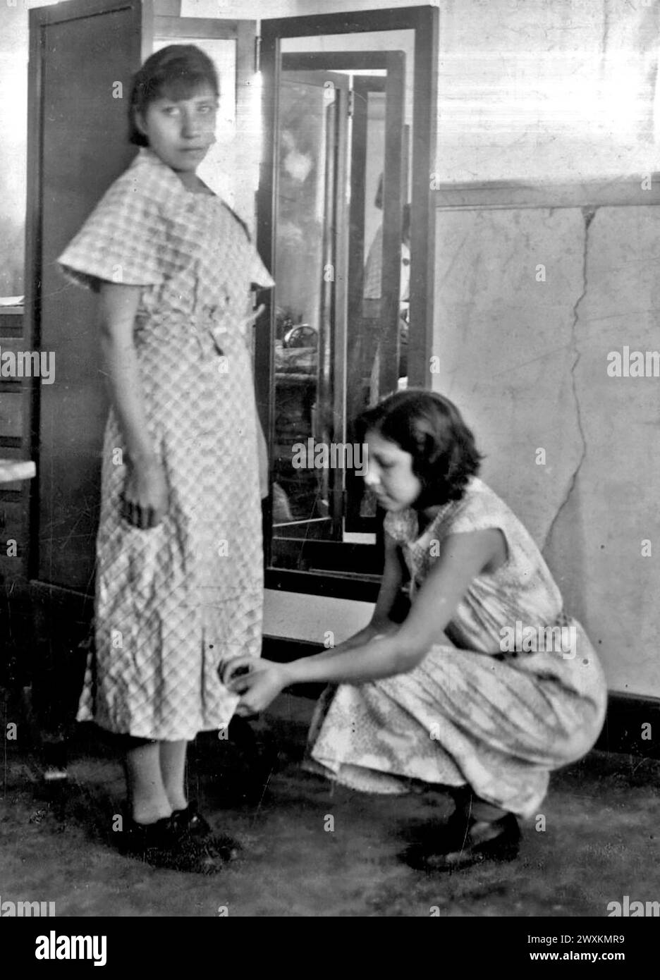 Two girls in a home economicis class in an Indian school in South ...