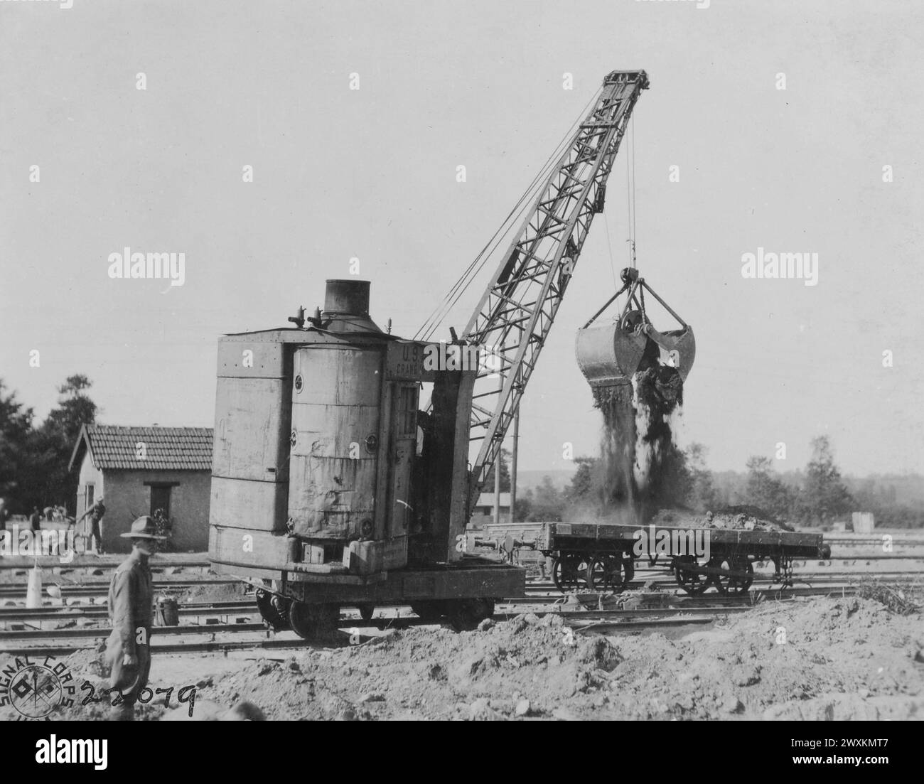 An officer watching a steam shovel in action; Marcy, France ca. 1918 ...