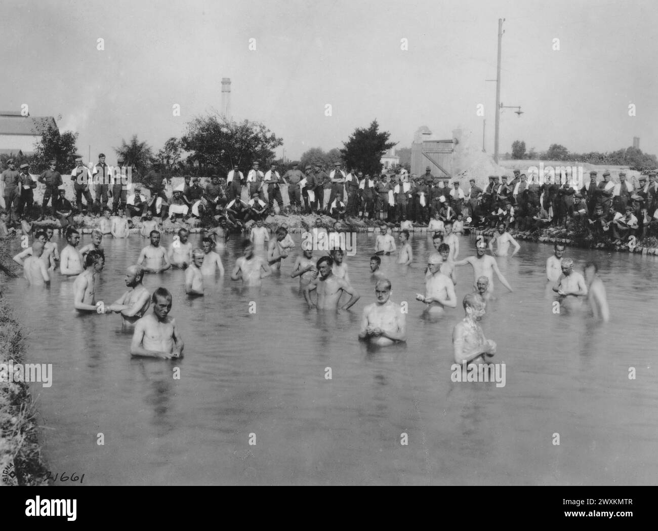 German prisoners of war taking a bath in a special constructed swimming ...