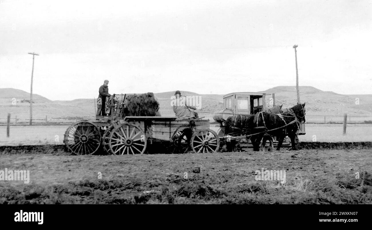 Workers on a road construction wagon in rural South Dakota ca. 1930s ...