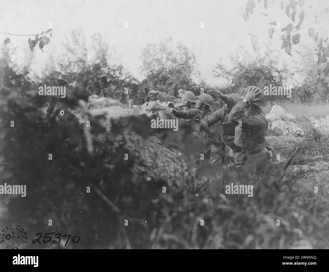 Members of the 332nd Infantry throwing bombs (grenades?); headquarters ...