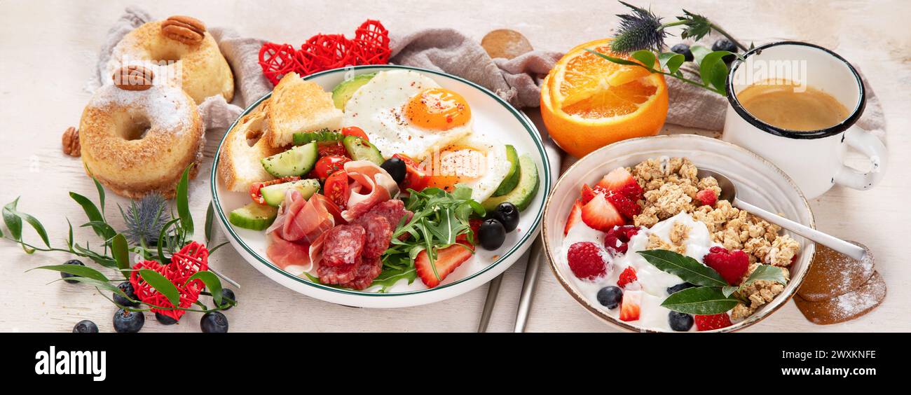 Healthy breakfast with oatmeal, berries, egg, bacon and a cup of coffee ...