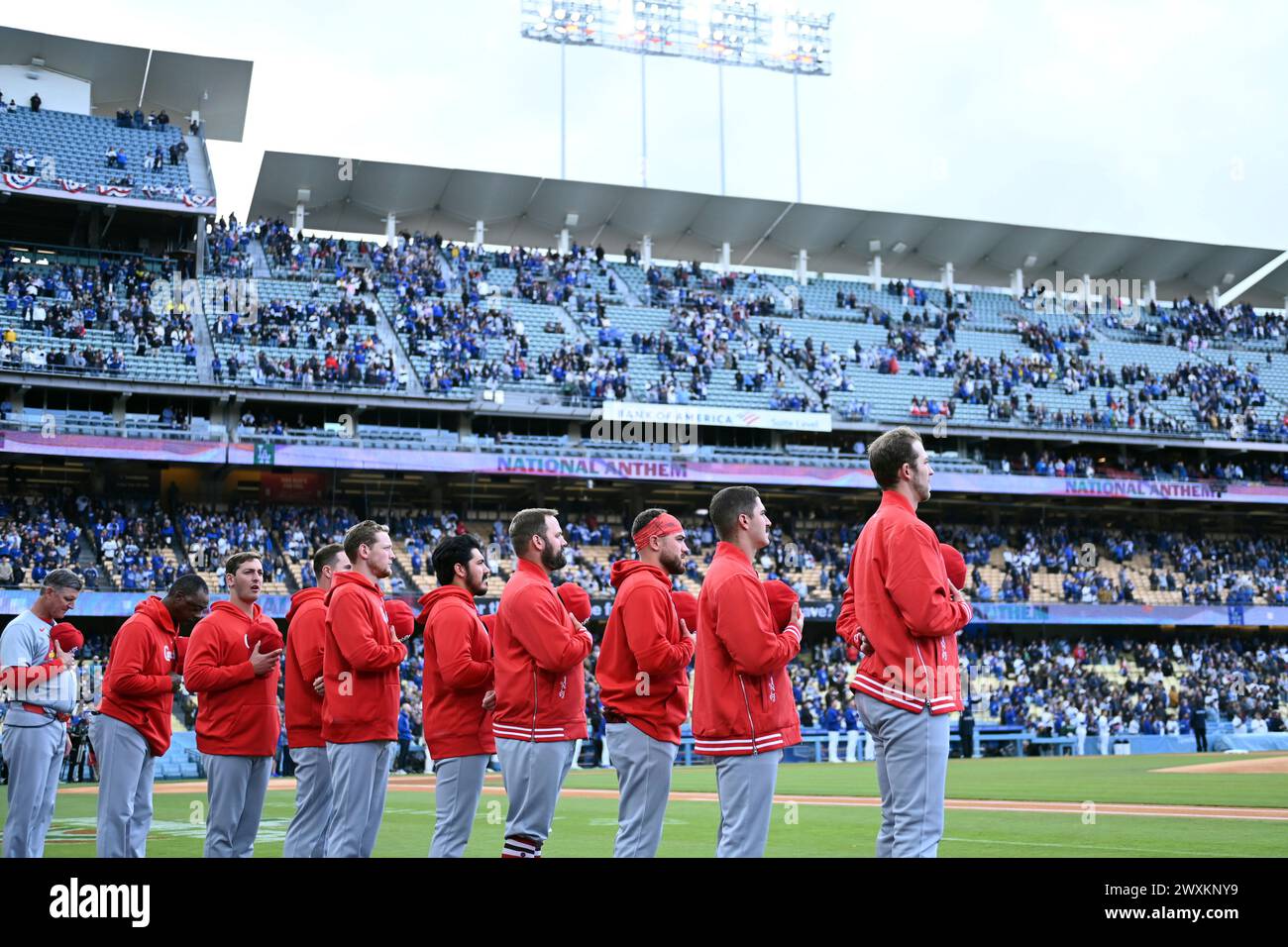 St. Louis Cardinals players sing the national anthem ahead of the MLB ...