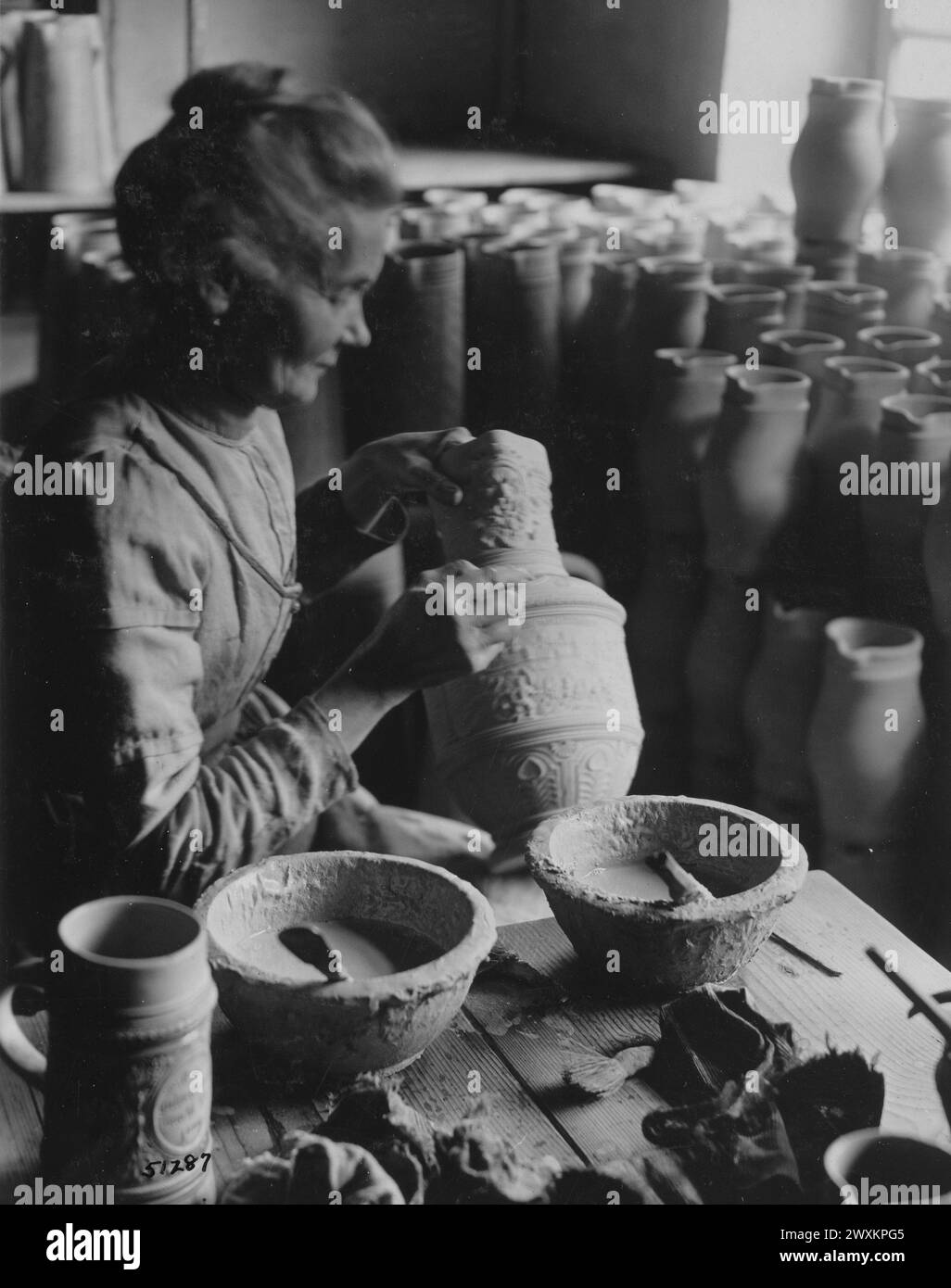 Original Caption: I. W. Remy Fabrek, manufacturing principally steins ...