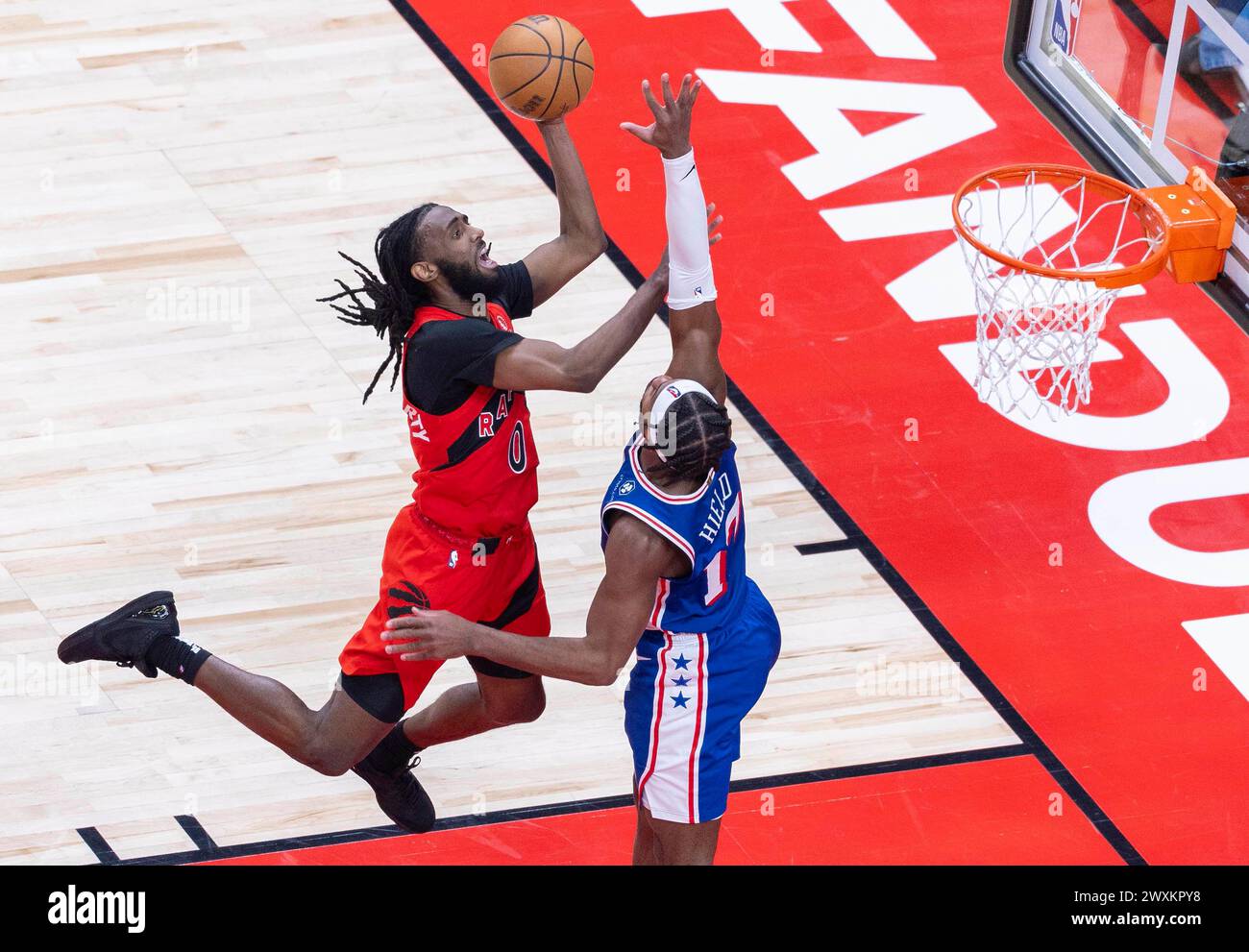 Toronto, Canada. 31st Mar, 2024. Javon Freeman-Liberty (L) of Toronto ...