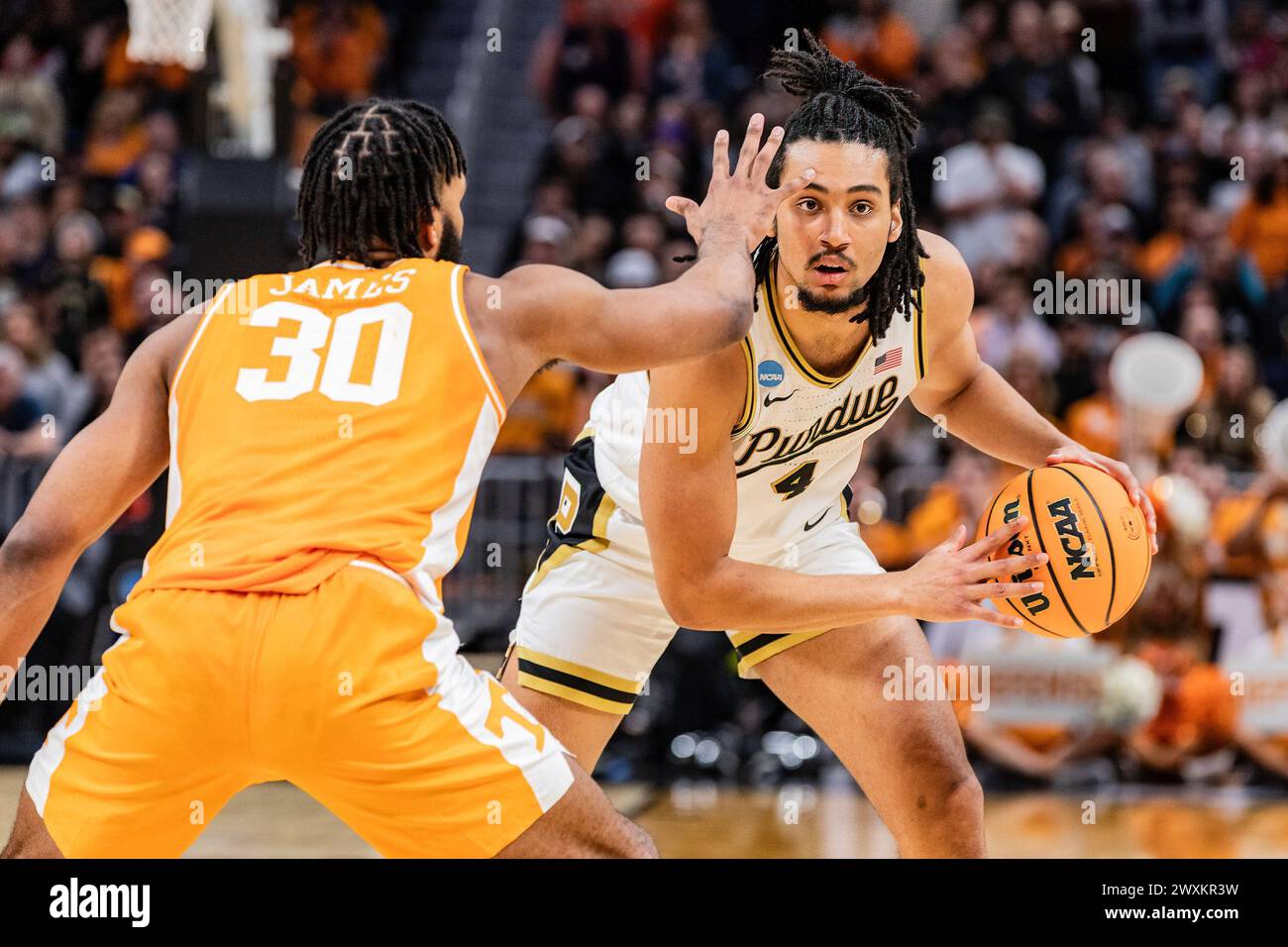 Detroit, United States. 31st Mar, 2024. Josiah-Jordan James (L) of the ...