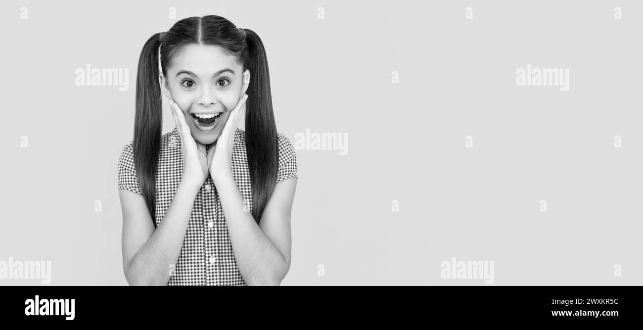 Surprised girl child touch beautiful face keeping mouth open with ...