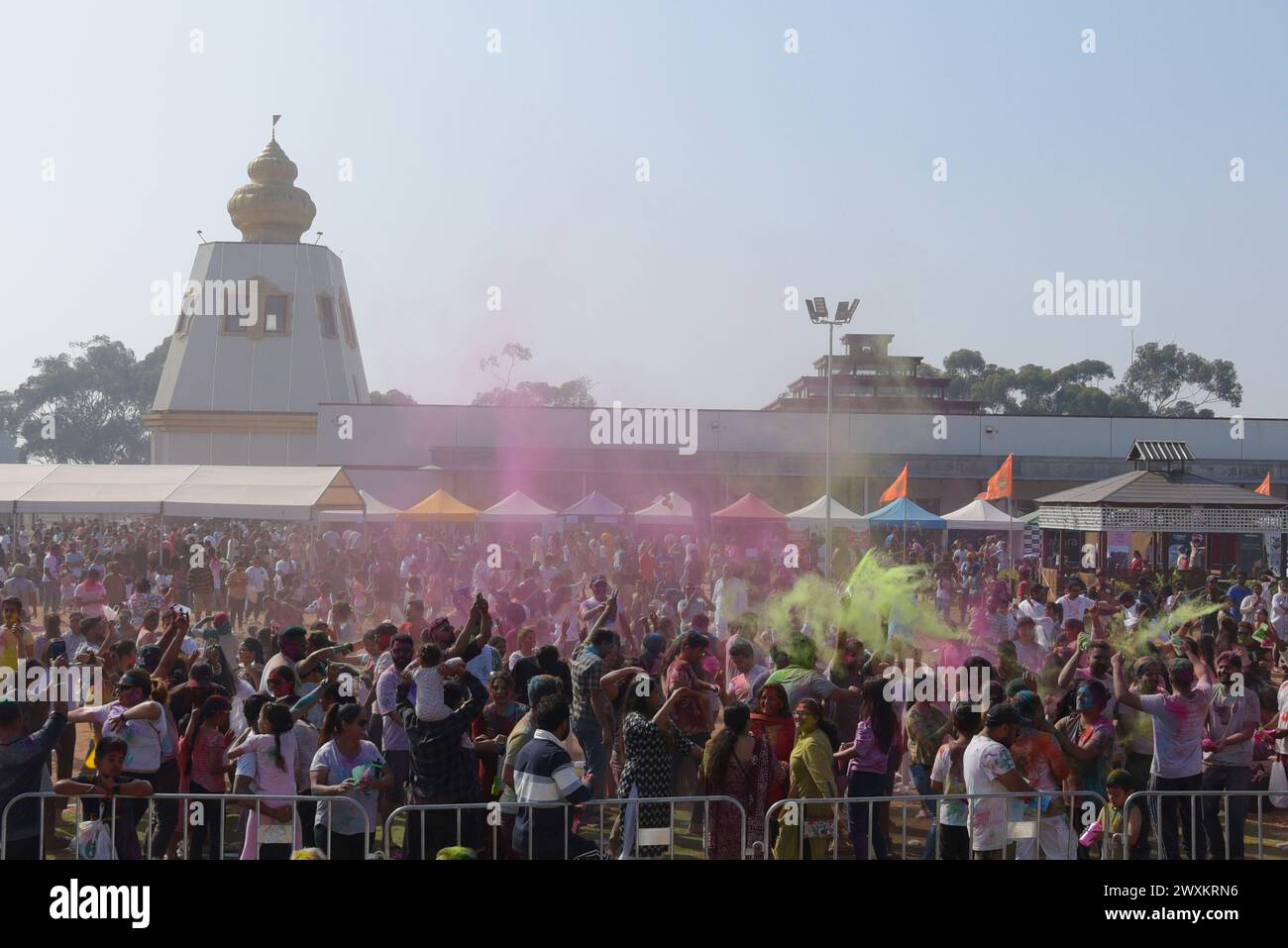 People celebrating Festivals of colors Holi at Sri Durga Mata Temple in ...
